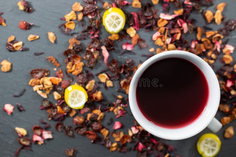 Fruit Tea in Front of a Dark Background Stock Image - Image of petals ...