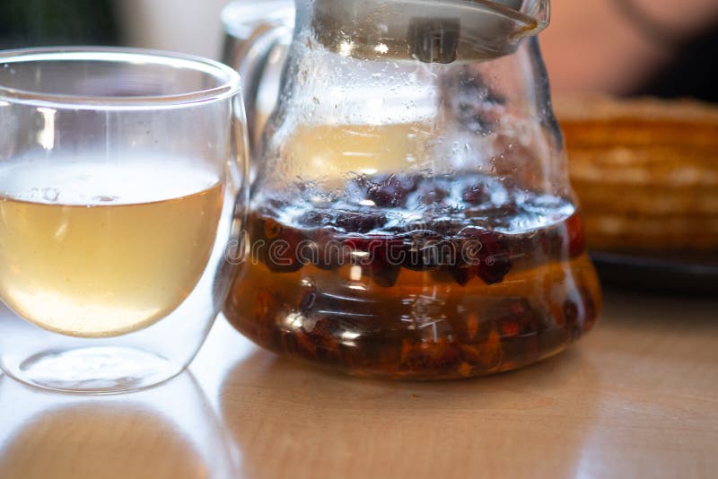 Fruit Tea in a Transparent Teapot and Mug. Stock Photo - Image of ...