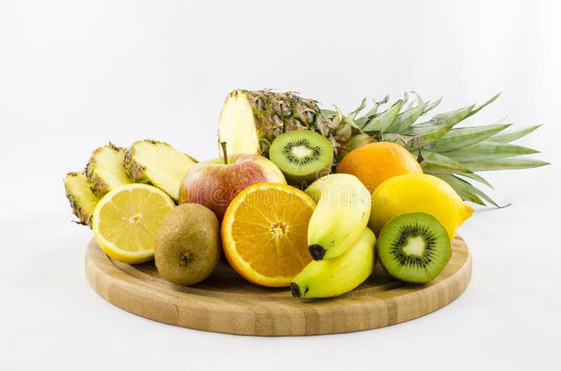 Fruits Composition on Wooden Board with Cut Fruits. Stock Image - Image ...