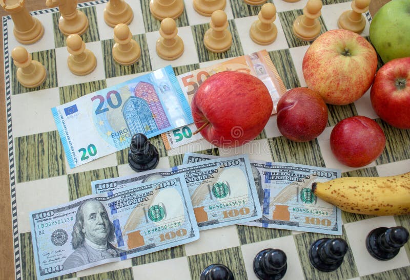 Fruits, Dollar and Euro Bills on the Chess Board Stock Photo - Image of ...