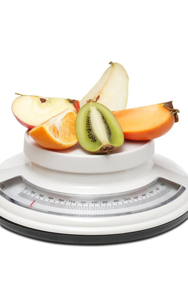 Fruits on kitchen scales stock image. Image of fruit, isolated - 7489315