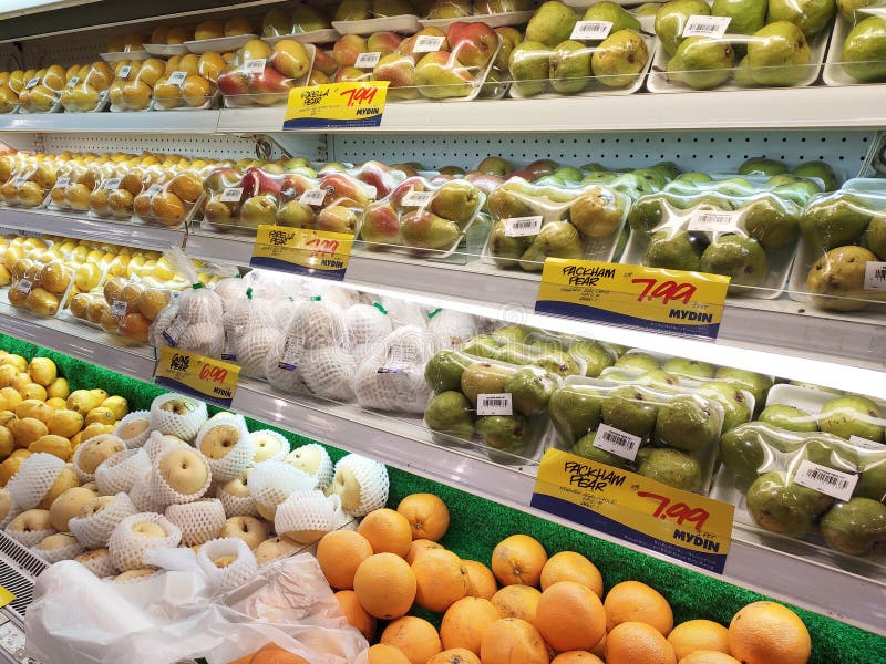 Fruits Packed Inside Plastic Container and Plastic Wrap. Editorial ...