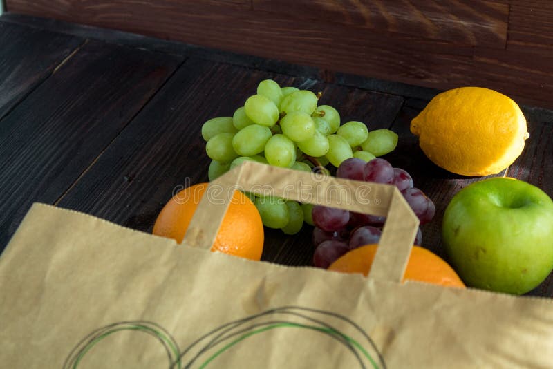 Fruits in a Paper Bag. Orange, Lemon, Apple, Grapefruit, Grapes Stock ...