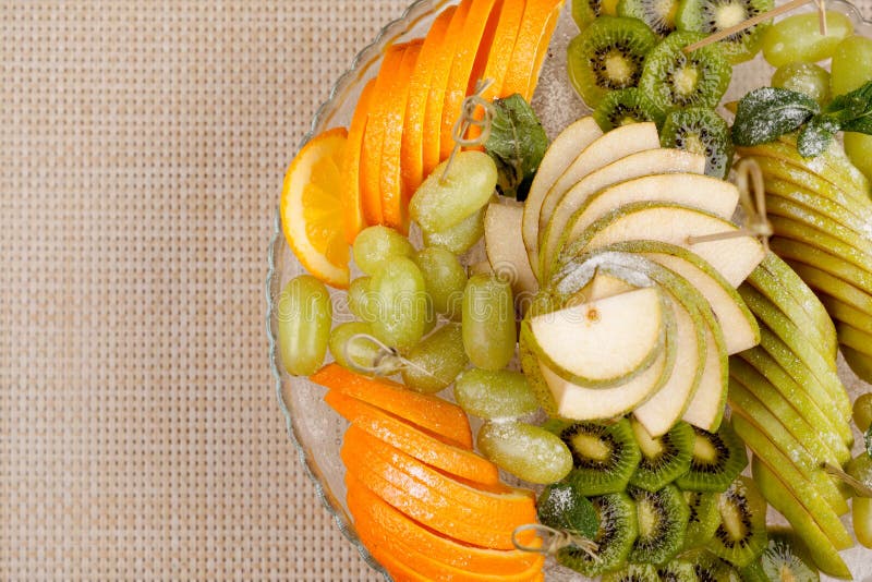Fruits in the plate stock image. Image of cutlery, kiwi - 141014483