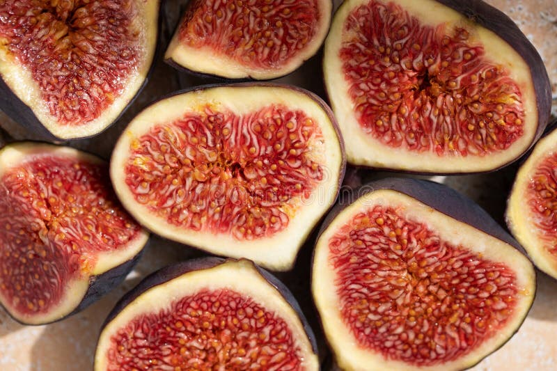 The Fruits of Sliced Fresh Figs are Lying on the Table. Top View Stock ...