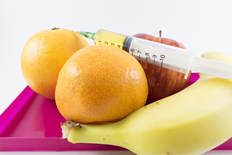 Fruits and syringe up. stock photo. Image of orange, scientist - 92764072