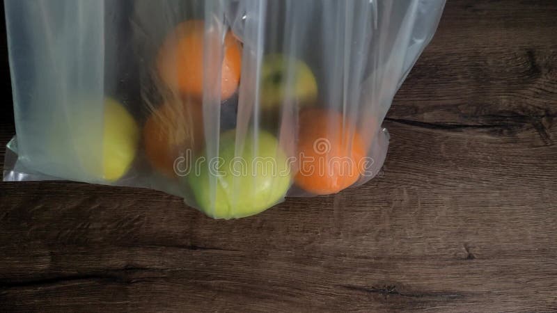 Fruits in a Transparent Plastic Bag Stock Video - Video of closeup ...