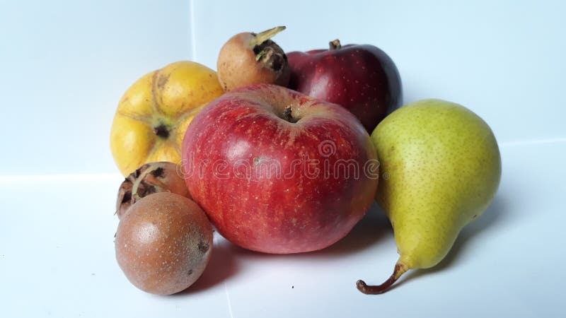 Fruits on white background stock photo. Image of fruits - 129933024