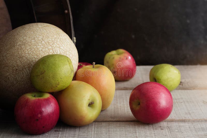 Fruits on wooden floor. stock image. Image of pear, green - 93784561