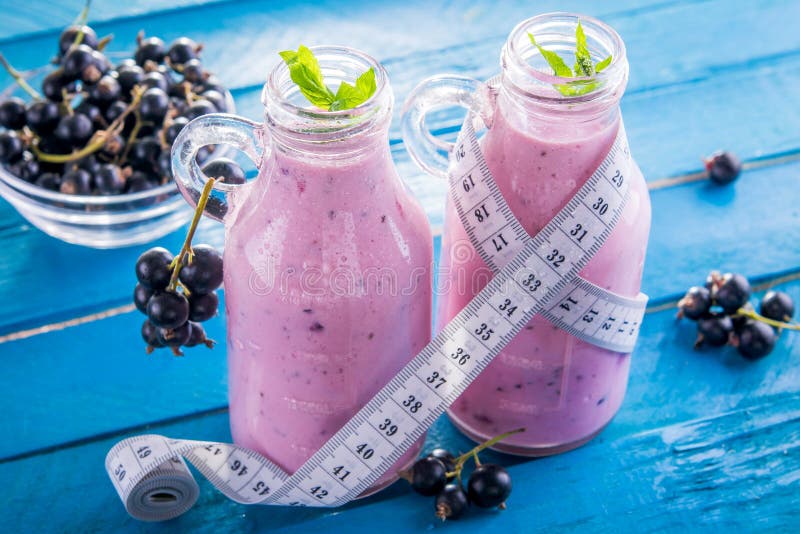Fruity Smoothie with Black Currant Stock Photo - Image of bottle ...
