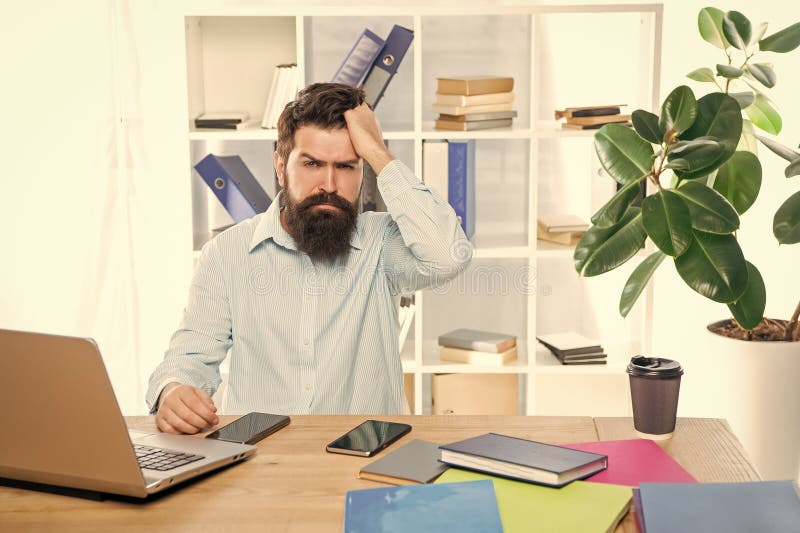 Frustated Professional Guy Clutching Head Working at Office Desk ...