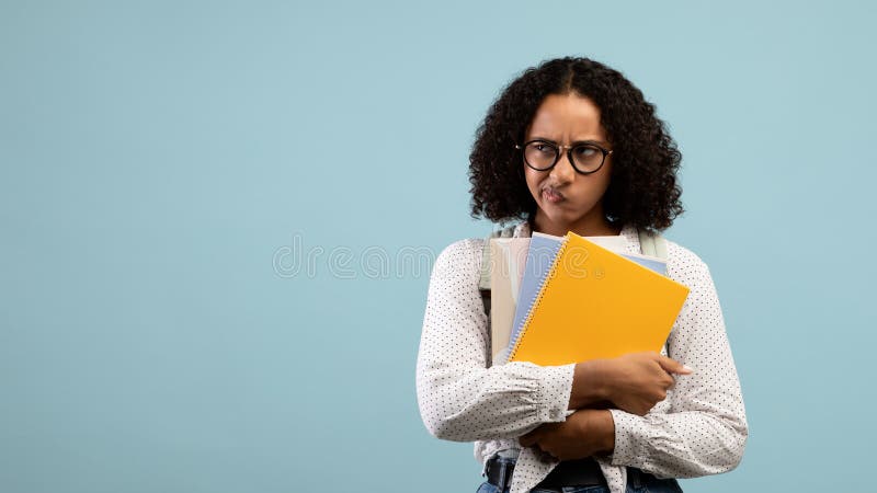 Frustrated Black Female Student with Backpack and Notebooks Looking at ...