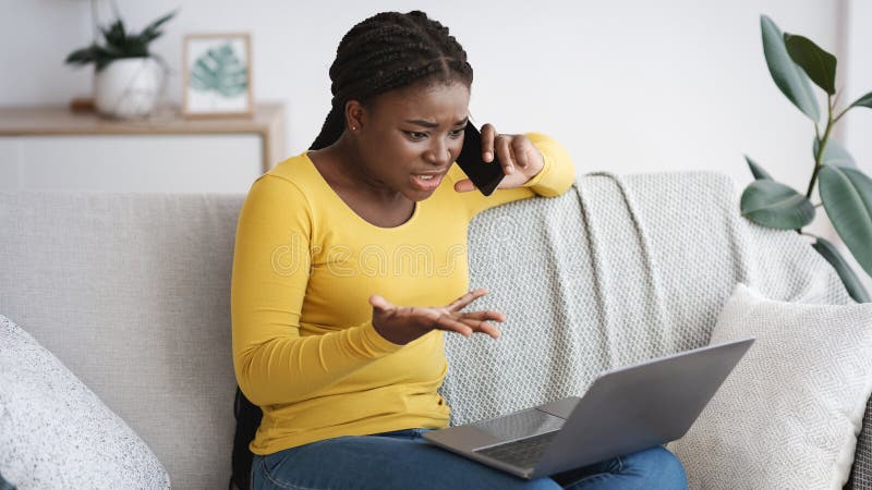Frustrated Man Using Phone and Laptop in Office, Solving Problem, Technical Issues and Business ...