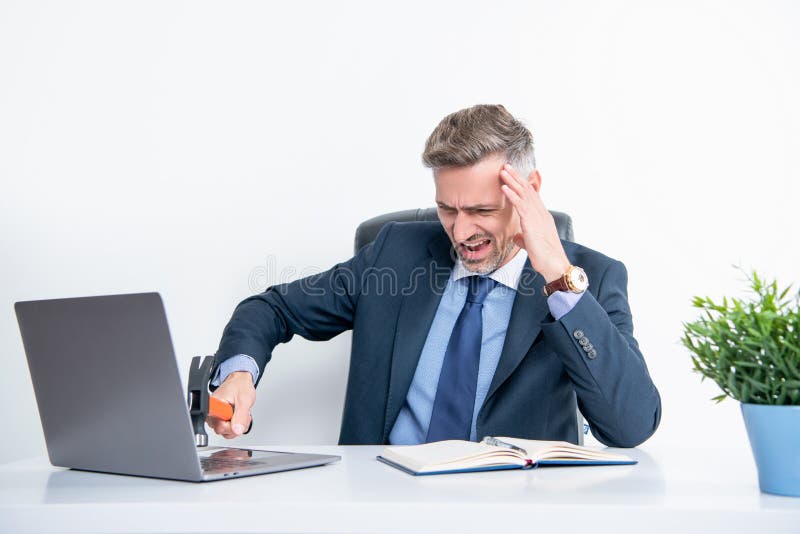 Frustrated Boss Hitting Laptop with Hammer in Office Stock Image ...