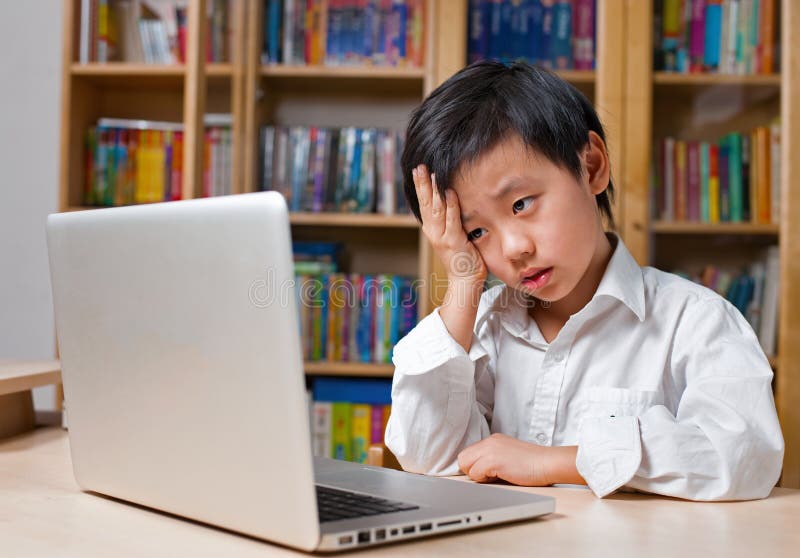 Frustrated Boy in White Shirt in Front of Laptop Computer Stock Image ...