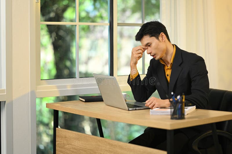 Frustrated Businessman Experiencing Mental Fatigue during Office Work ...