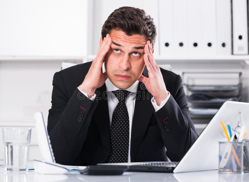 Frustrated Businessman at Office Desk Stock Photo - Image of keyboard ...