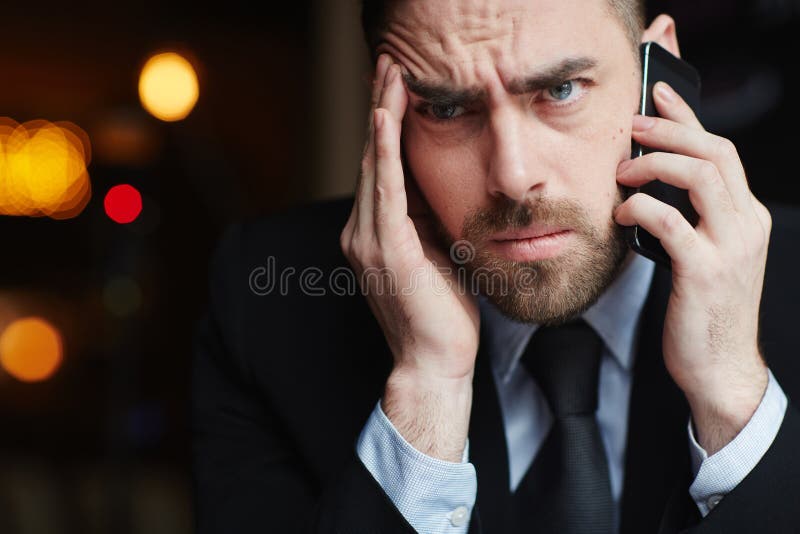 Frustrated Businessman Speaking on Phone Stock Image - Image of tension ...