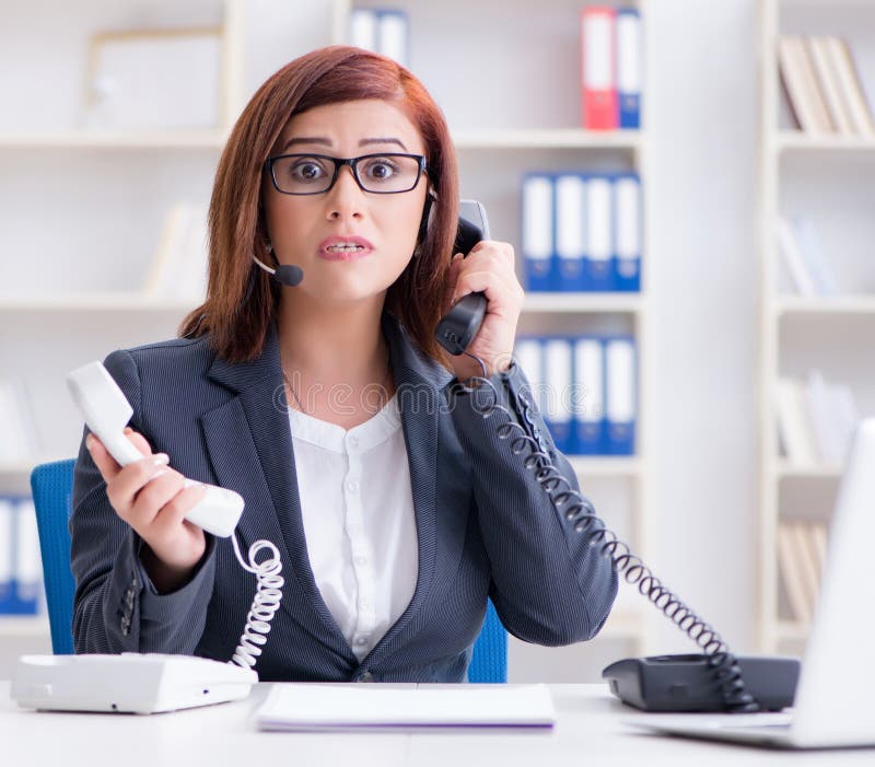 Frustrated Call Center Assistant Responding To Calls Stock Image ...