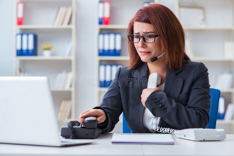 Frustrated Call Center Assistant Responding To Calls Stock Image ...