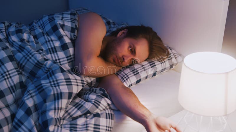 Frustrated Caucasian Man Having Sleeping Problems. Noisy Neighbours ...