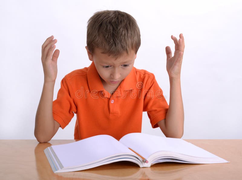Frustrated Child with Learning Difficulties Stock Photo - Image of grey ...