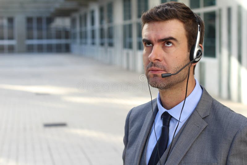 Frustrated Customer Service Worker Rolling His Eyes Stock Photo - Image ...