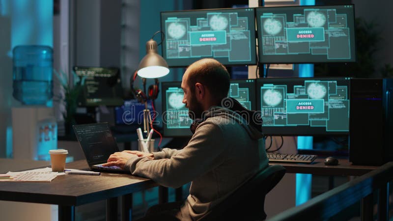 Frustrated Hacker Using Computer To Break into Corporate Data Servers Stock Footage - Video of ...