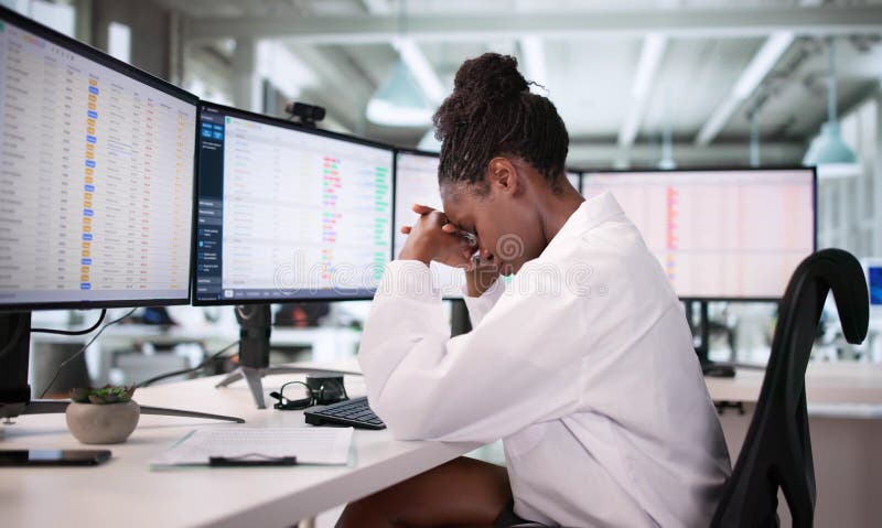 Frustrated Hospital Nurse Struggles with Data Spreadsheets Stock Image ...