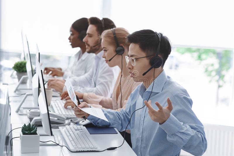 Frustrated Hotline Operator Dealing with Client Problem in Call Centre ...