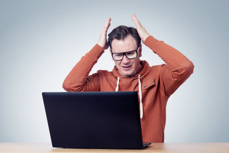 130 Sad Man Behind Computer Stock Photos - Free & Royalty-Free Stock ...