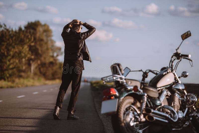 Frustrated Man on Road with Broken Cruiser Motorcycle Stock Image ...