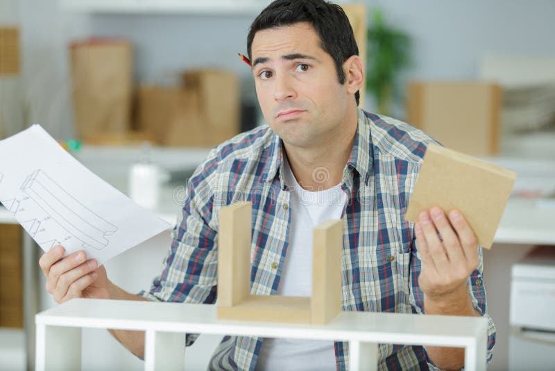 Frustrated Man Working with Wood Stock Photo - Image of furniture, work ...