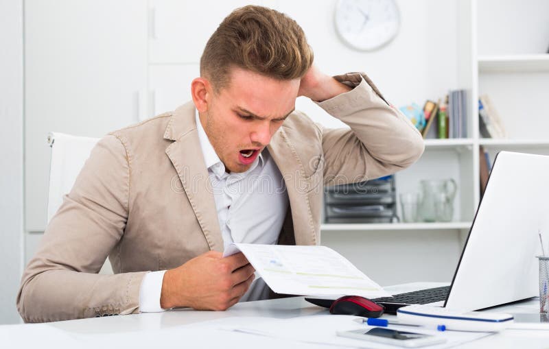 Frustrated Manager Doing Paperwork at Office Stock Photo - Image of ...