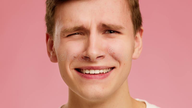 Frustrated Millennial Guy Crying Looking at Camera Over Pink Background ...