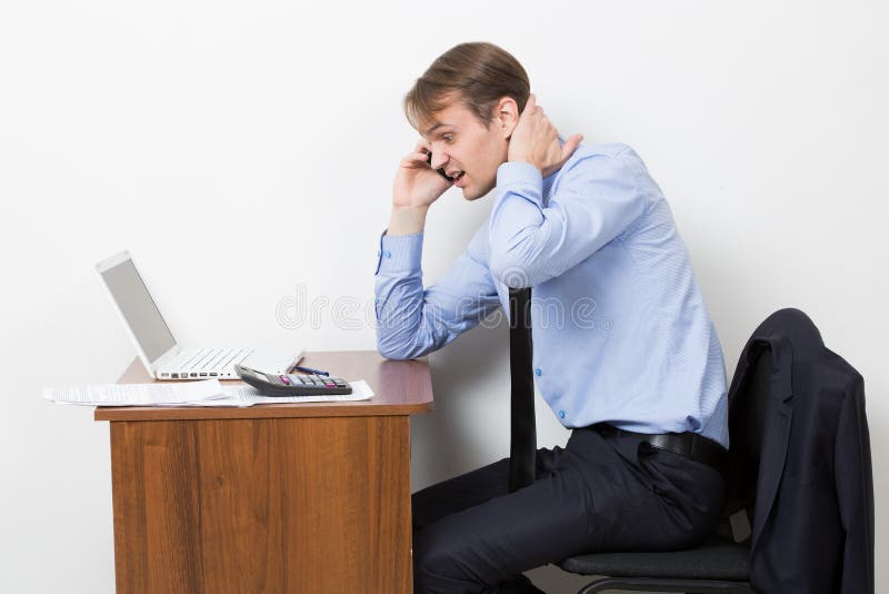 Frustrated Office Worker On The Phone Stock Photo - Image of male ... Frustrated Office Worker On The Phone Stock Photo - Image of male ...