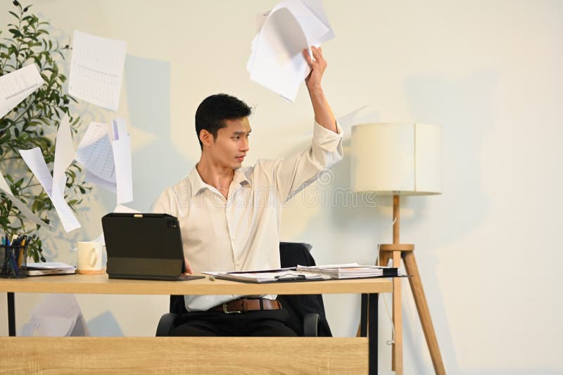 Frustrated Office Worker Throwing Documents in Anger. Stress at Work ...