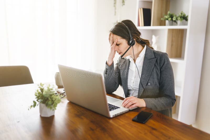 Frustrated and Sad Woman Working on Laptop at Home Stock Photo - Image ...