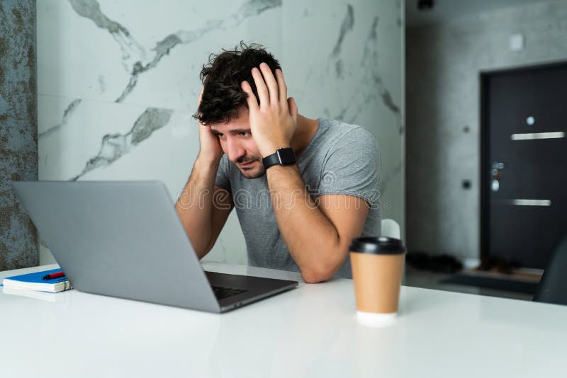 Frustrated Sad Young Man Looking at Laptop Screen, Feeling Nervous ...