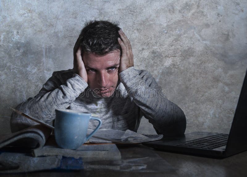 Frustrated and Stressed Young College Student Man Working with Textbook ...