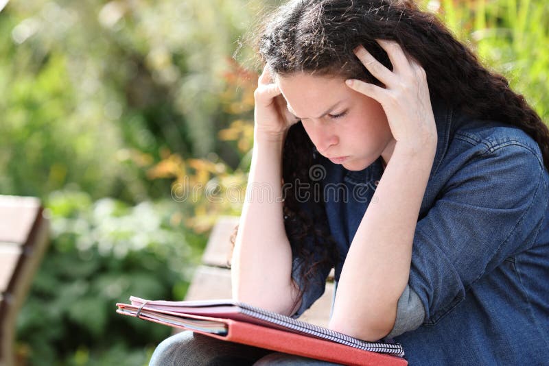 Frustrated Student Trying To Understand Lesson in a Park Stock Photo ...