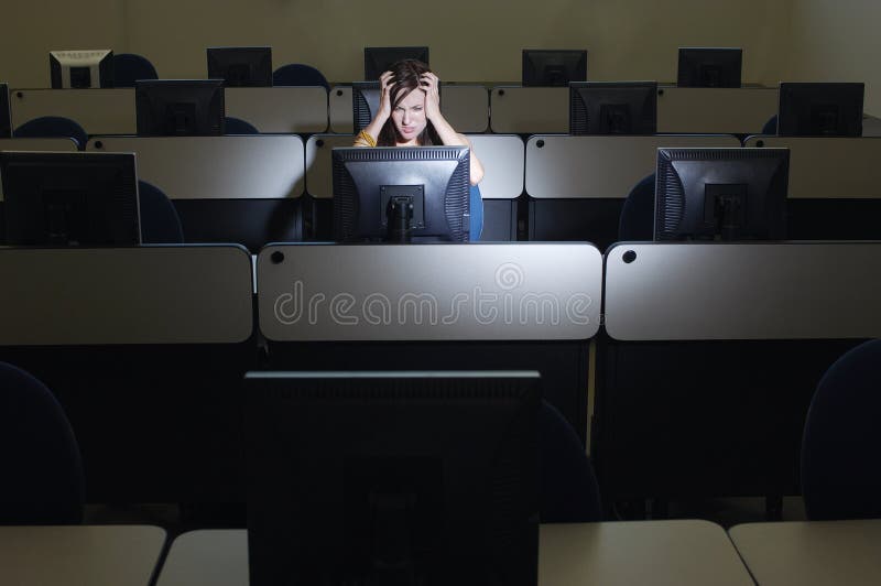 Frustrated Student Using Computer in Lab Stock Photo - Image of ...