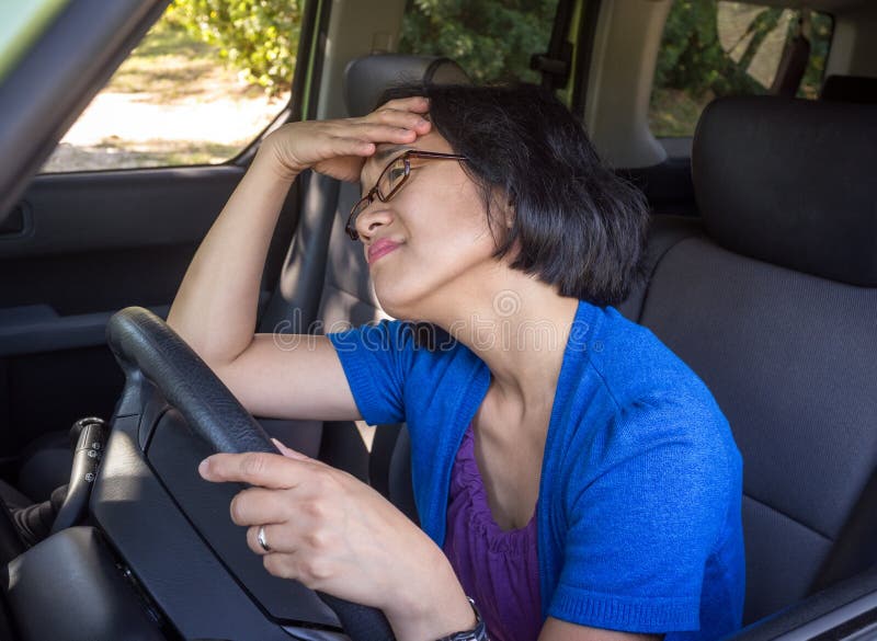 Frustrated Woman in Car in Traffic Jam Stock Photo - Image of asian ...