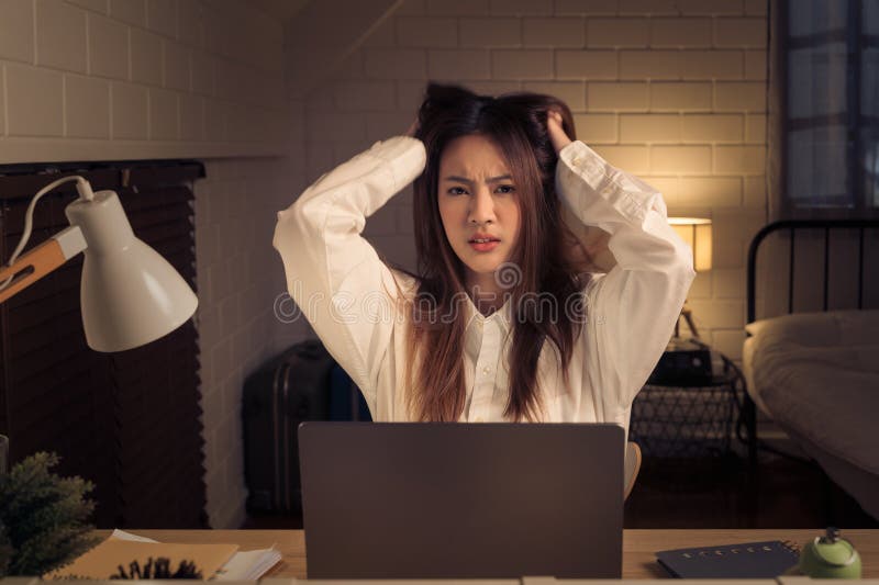 Frustrated Woman Facing Challenges while Working Late at Home Stock ...