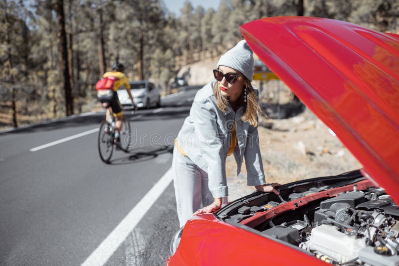 Woman Having Problems with a Car while Traveling Stock Photo - Image of ...