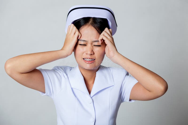 Frustrated Young Asian Nurse Stock Photo - Image of healthcare ...