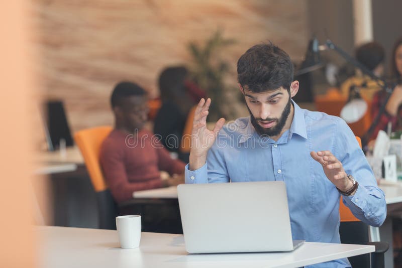 Frustrated Young Business Man Working on Desktop Computer Stock Photo ...