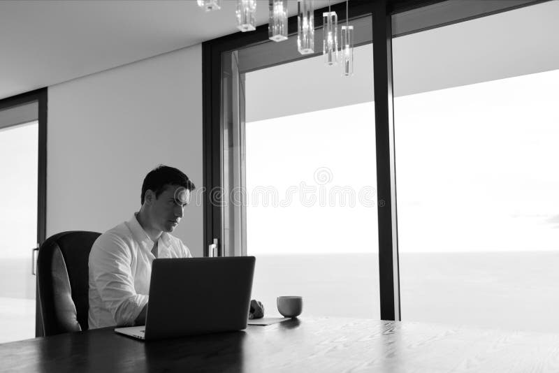 Frustrated Young Business Man Working on Laptop Computer at Home Stock ...