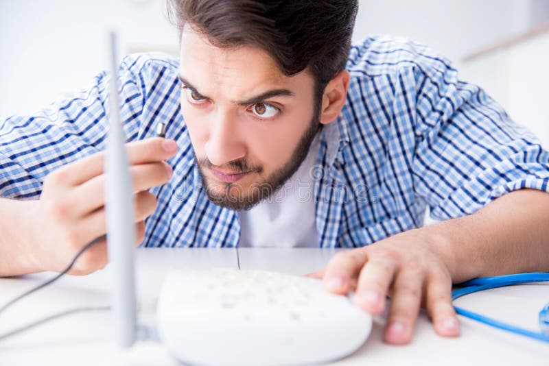 The Frustrated Young Man Due To Weak Internet Reception Stock Photo ...