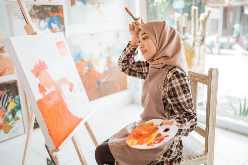 Muslim Female Artist while Working in Her Project at Studio Stock Photo ...